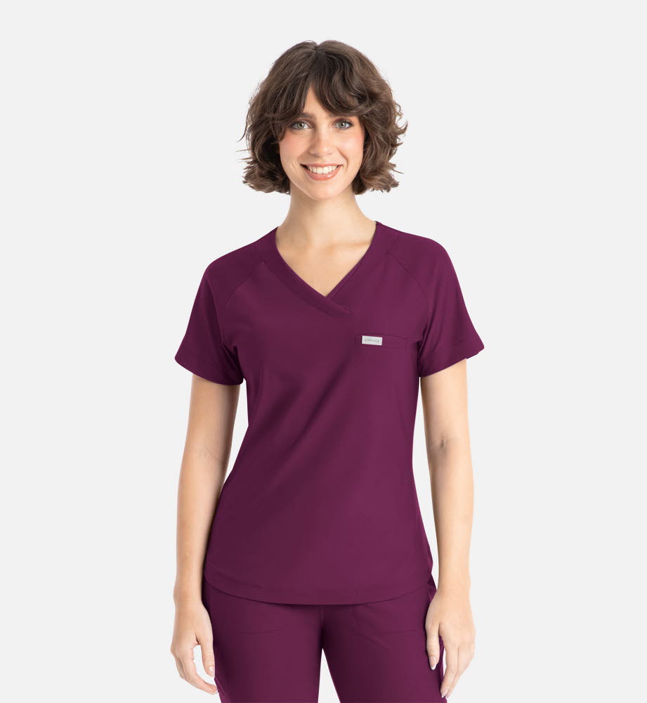 Women's Luna Tuckable Scrub Top at Stitch Logo
